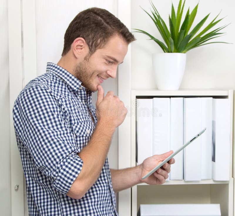 Man with tablet PC stock photo. Image of positive, tablet - 35690156