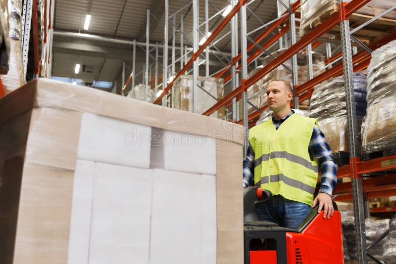 Man with Tablet Pc Operating Forklift at Warehouse Stock Image - Image ...