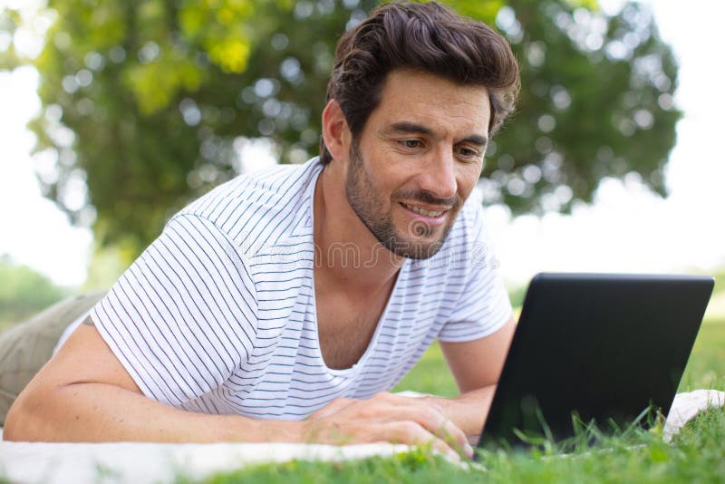 Man with Tablet Pc in Park on Sunny Day Stock Photo - Image of handsome ...