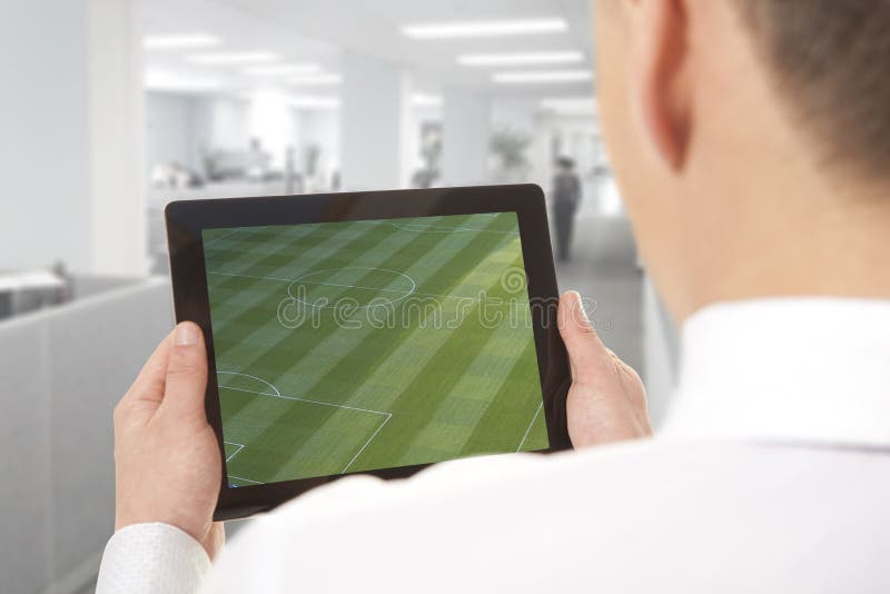 Man with Tablet with Soccer Game Stock Image - Image of people, concept ...