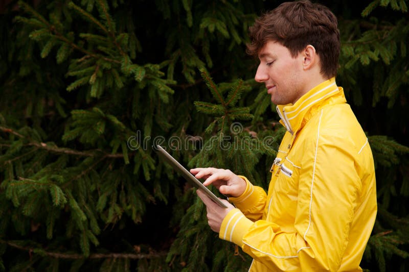 Man with tablet stock image. Image of nature, spring - 35551843