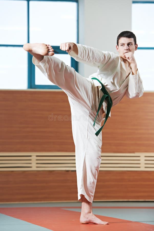 Man at taekwondo exercises stock image. Image of martial - 28686043