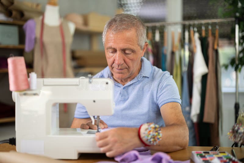 Man Tailor Sews on Sewing Machine in Workshop Stock Photo - Image of ...