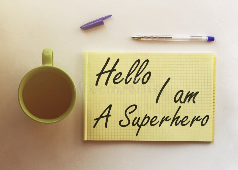 Man Take a Paper with Text Hello I am a Superhero on the Shirt with ...