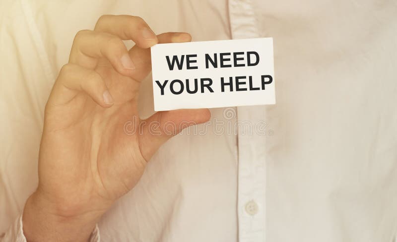 Man Take a Paper with Text we Need Your Help on the Shirt Stock Image ...