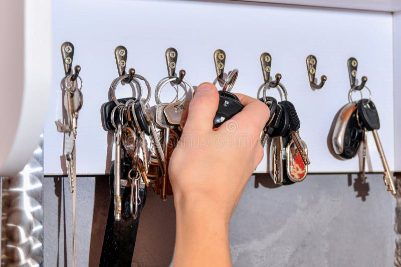The Man Takes the Keys before Leaving the House Stock Image - Image of ...