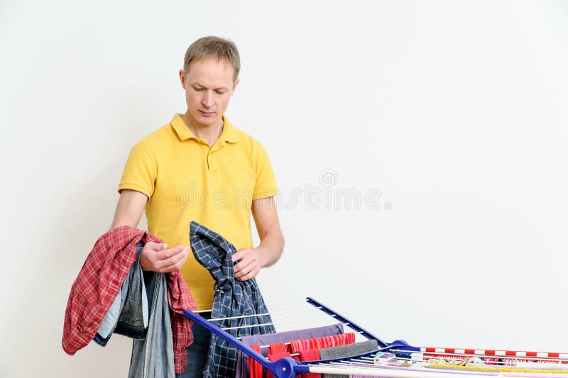 Man Hanging Rack Drying Off Stock Photos - Free & Royalty-Free Stock ...