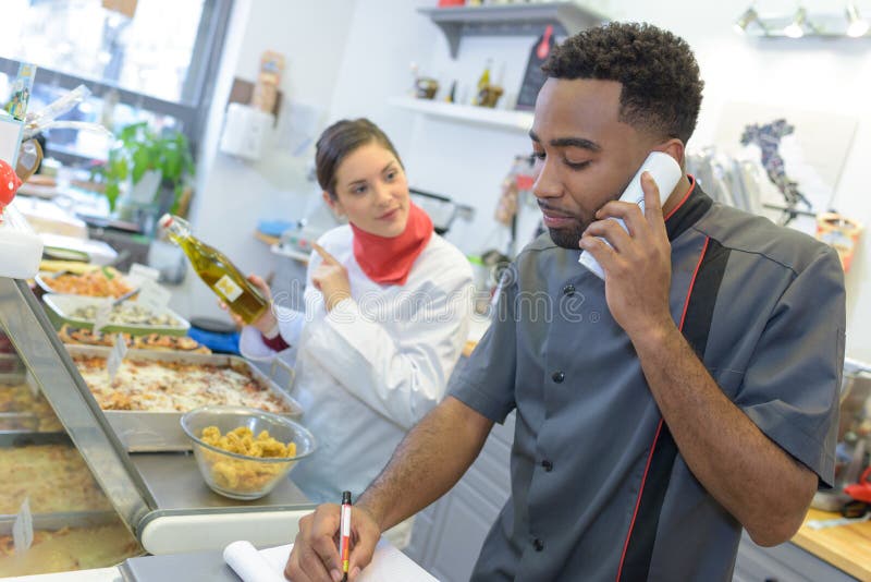 Man Takes Order by Phone in Workshop Stock Photo - Image of occupation ...
