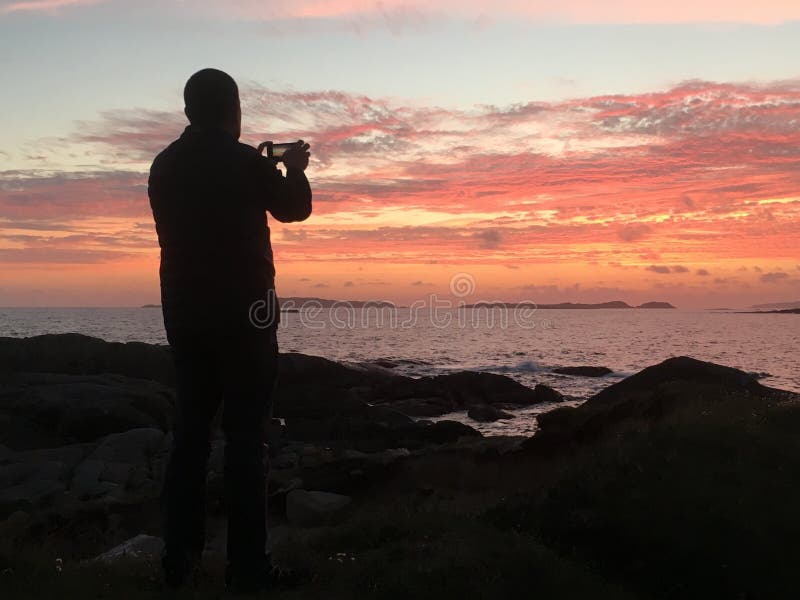 Man Takes a Photo of Sunset Editorial Stock Photo - Image of phone ...