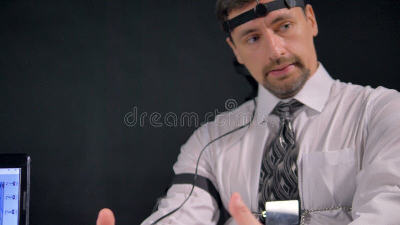 A Man Takes Shaking Breaths during a Polygraph Test. Stock Video ...