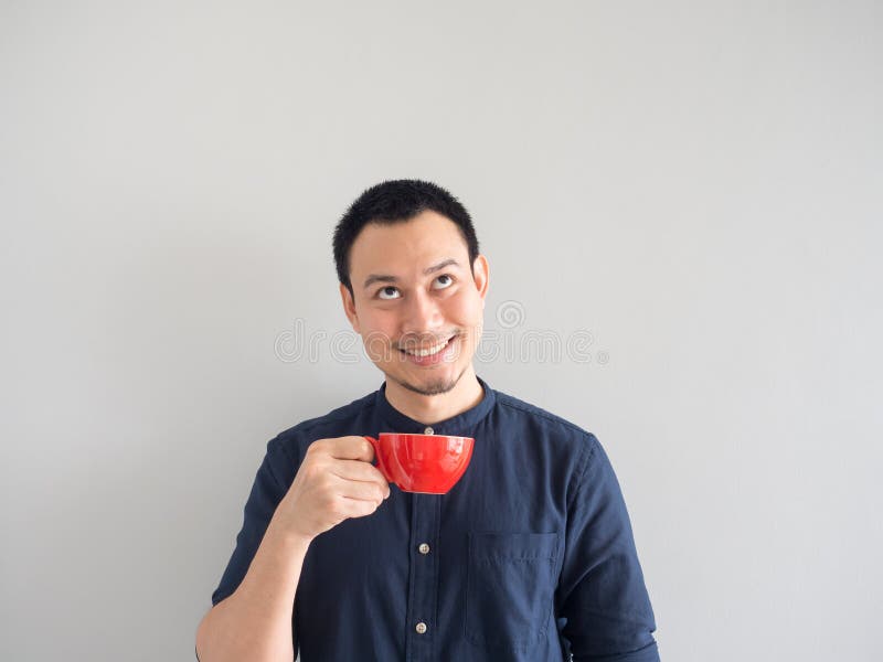 Man Takes a Sip of Coffee in Red Cup. Stock Image - Image of asian ...