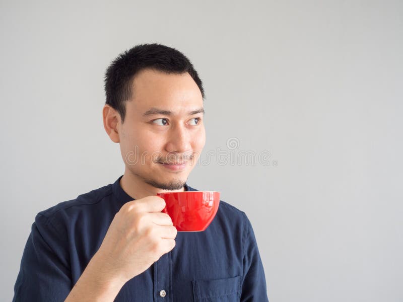 Man Takes a Sip of Coffee in Red Cup. Stock Image - Image of cafe ...