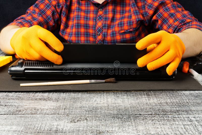 The Man is Taking Apart the Laptop. Computer Service and Repair Stock ...
