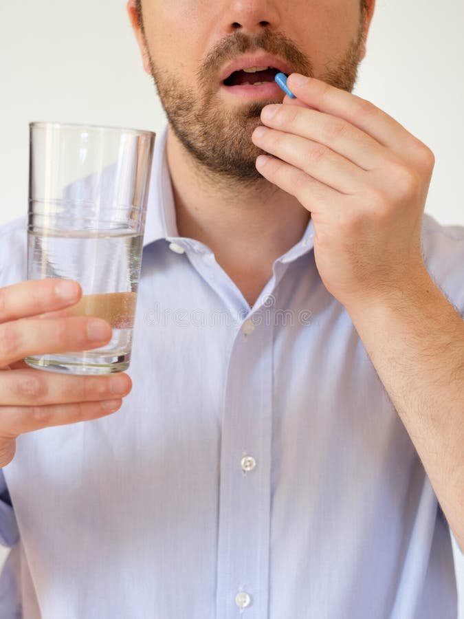 Taking Blue Pill Stock Photos - Download 1,113 Royalty Free Photos