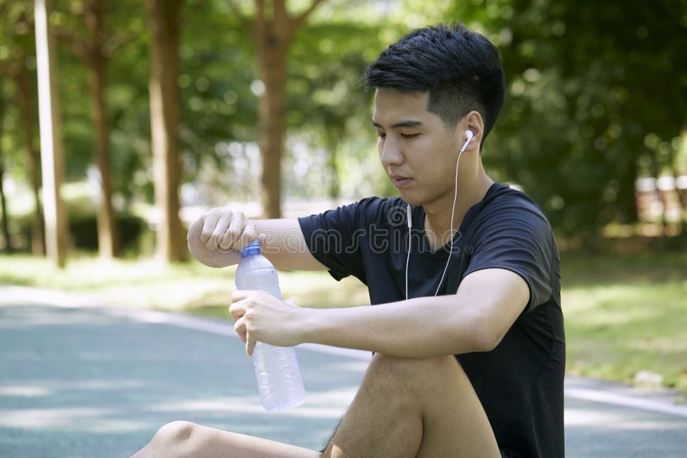 Man Taking a Break from Exercise Stock Photo - Image of male, jogger ...