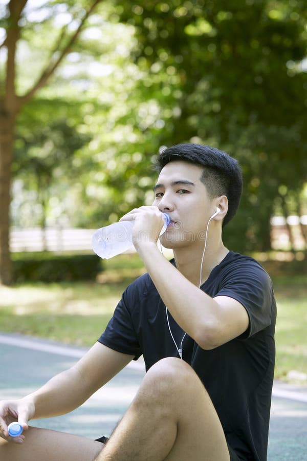 Man Taking a Break from Exercise Stock Photo - Image of athletic ...