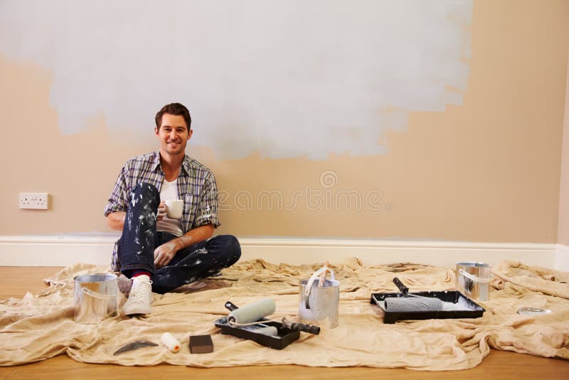 Man Taking a Break Whilst Decorating Room Stock Image - Image of male ...