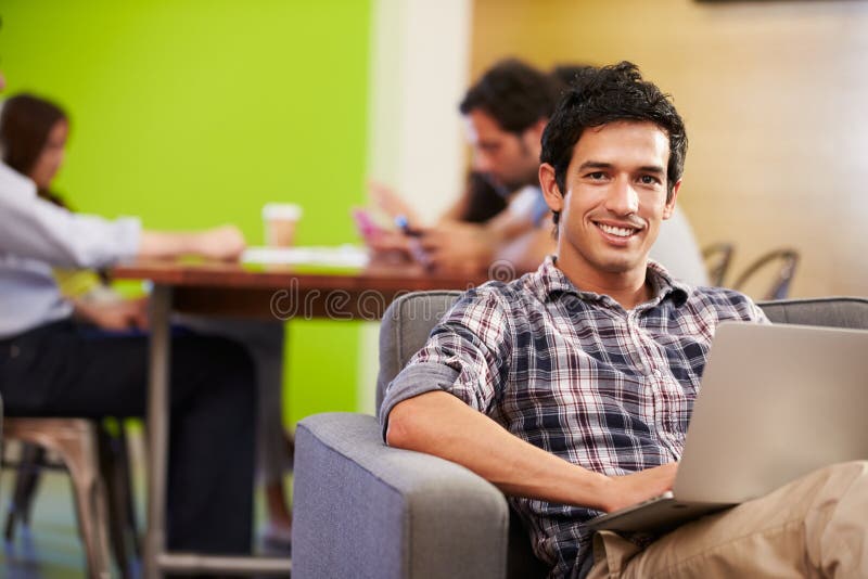 Man Taking a Break Working in Design Studio Stock Image - Image of ...