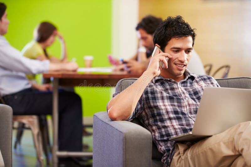 Man Taking a Break Working in Design Studio Stock Image - Image of ...