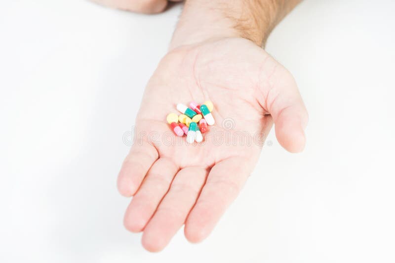 Man taking drugs stock photo. Image of painkillers, tablet - 81115138