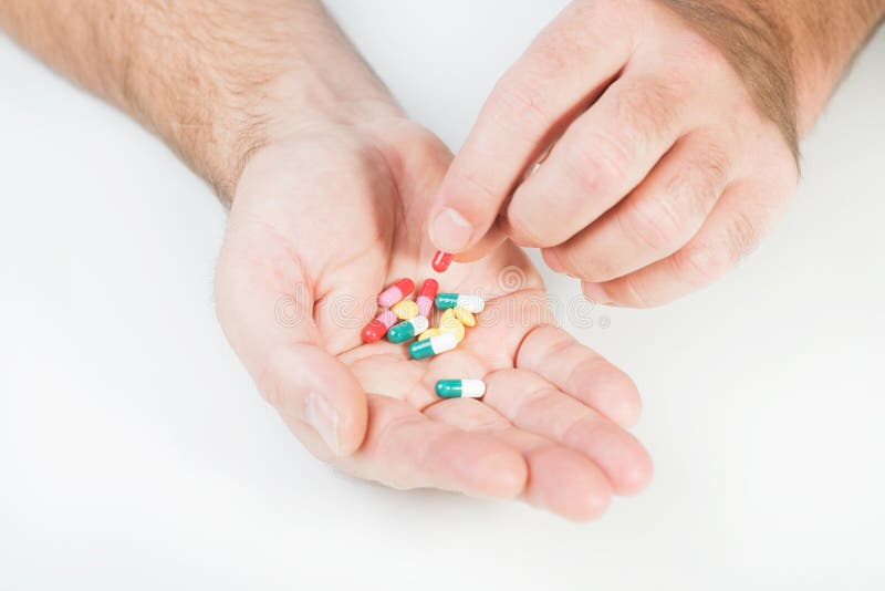 Man taking drugs stock photo. Image of addiction, container - 81127740