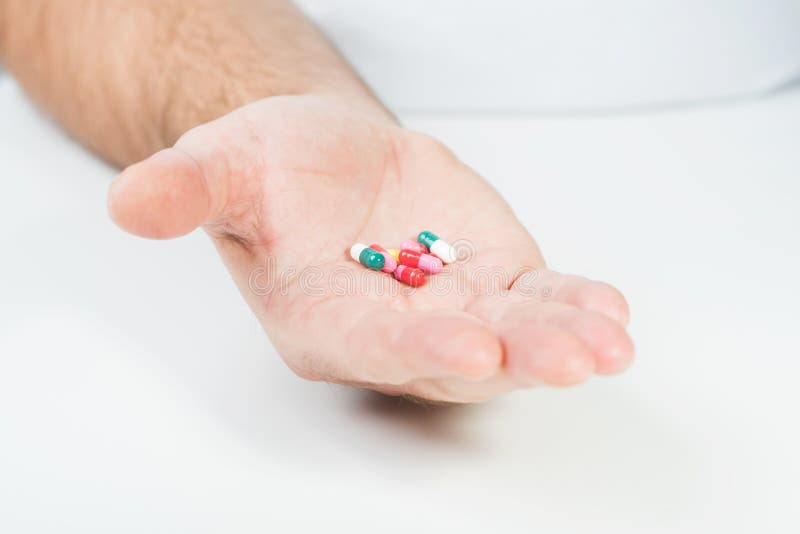 Man taking drugs stock photo. Image of pharmacy, overdosage - 81732604