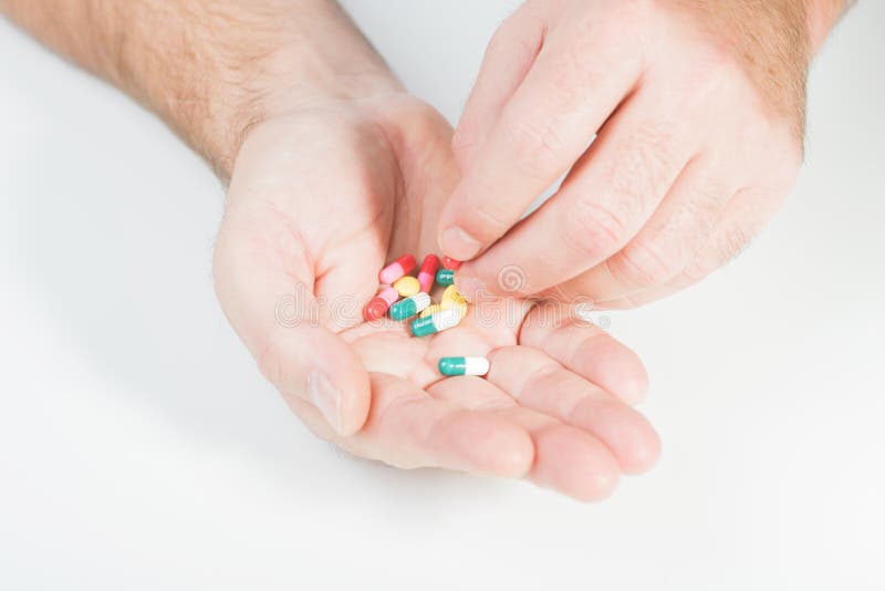 Man taking drugs stock image. Image of prescription, allergy - 81732645