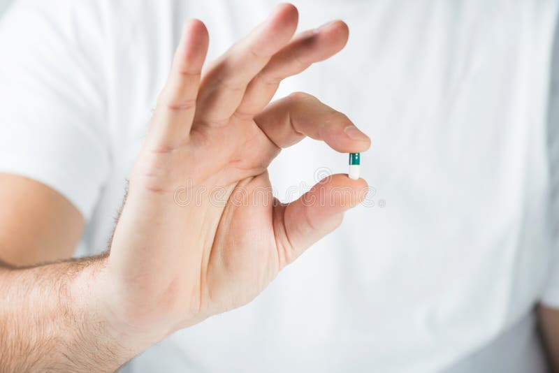 Man taking drugs stock photo. Image of health, ache, drug - 81745822