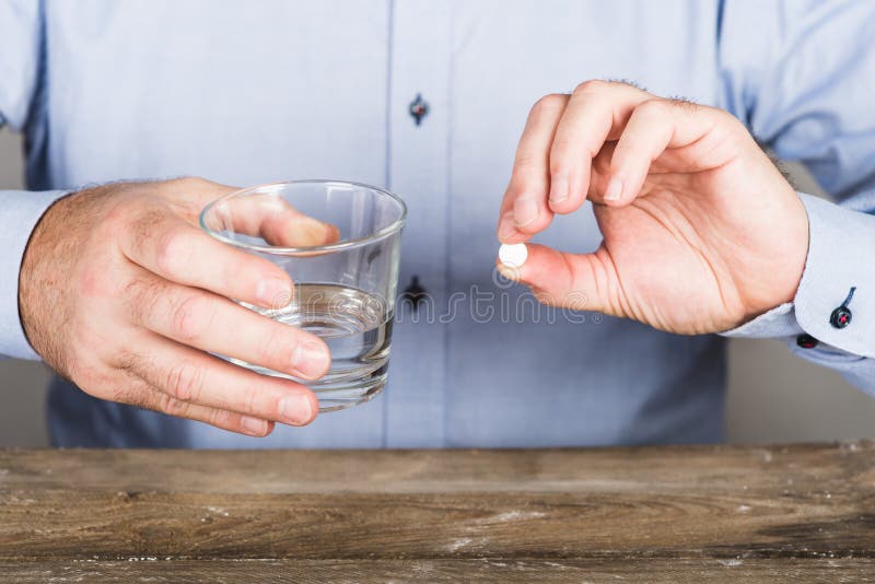 Man taking drugs stock photo. Image of dose, study, medicines - 85225260