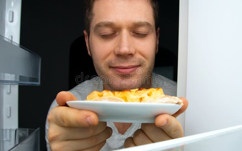 Man taking food. stock photo. Image of bulimia, door - 82541384