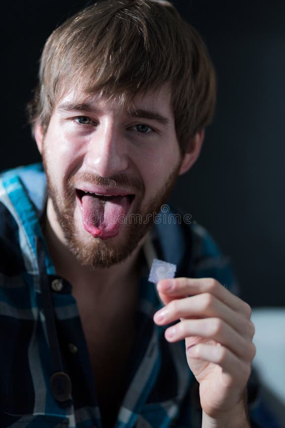 Man taking LSD stock photo. Image of dopey, narcotic - 59236624