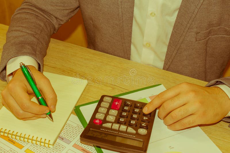 Man Taking Notes, Calculator on the Table. Success Motivation ...
