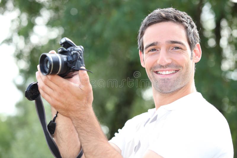 Man Taking Photo with DSLR Camera Stock Image - Image of shot ...