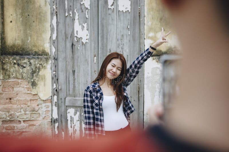 Man taking a photo of his girlfriend