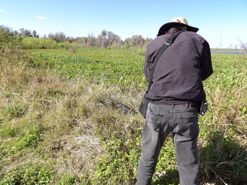 A Photo of the Back of a Person Taking Photo in the Wild Stock Image ...
