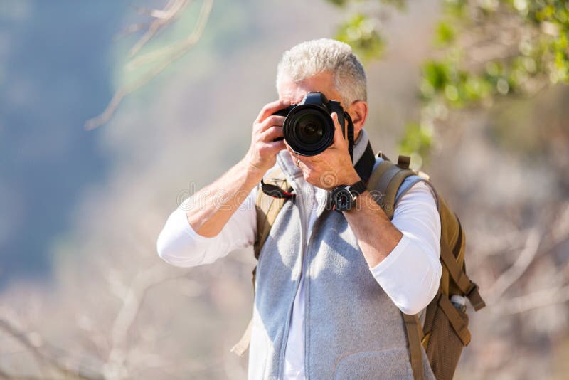 Man taking photos camera stock photo. Image of happy - 58311950
