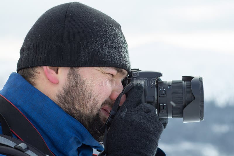 Man Taking a Picture with His Camera in Winter Stock Photo - Image of ...
