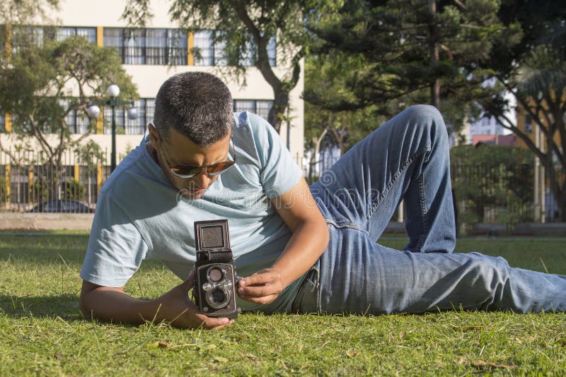 Man Taking Pictures with Old Camera Stock Image - Image of people ...