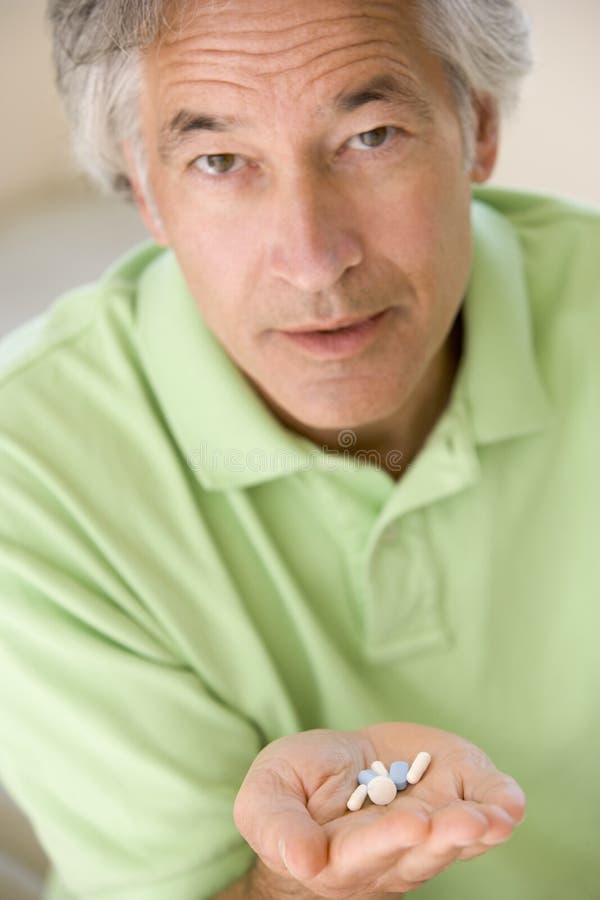 Man Taking Pills stock image. Image of color, drugs, sick - 7773867