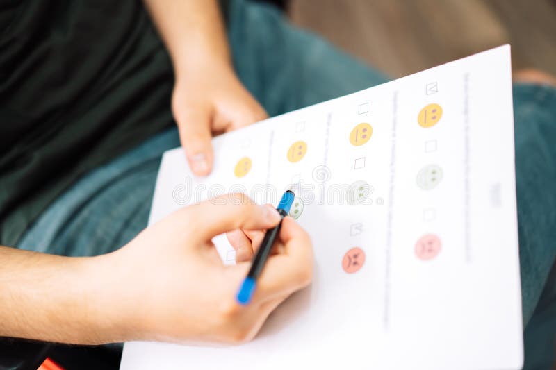 Man Taking a Psychological Test with Emoticons Stock Image - Image of ...