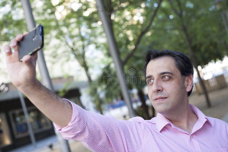 Man Taking Self Portrait with Mobile Phone Stock Image - Image of ...