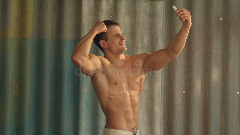 Man Taking a Selfie with His Phone while Training Stock Footage - Video of isolated, adult: 55860936