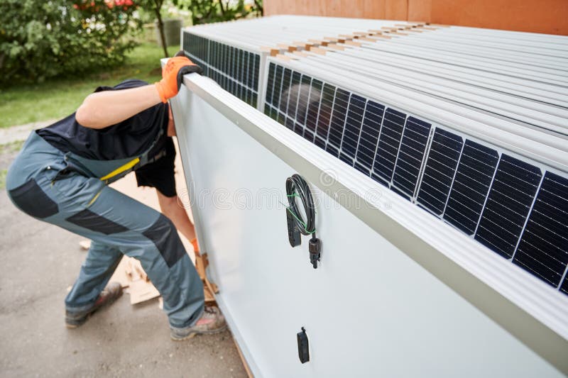 Man Taking Solar Panel for Carrying and Installing Stock Image - Image ...