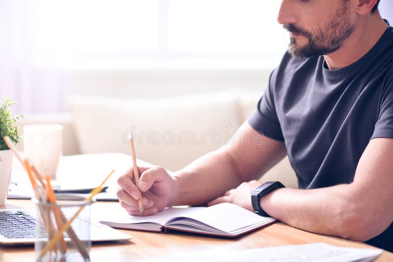 Man Taking Some Notes while Sitting Stock Image - Image of discerning ...