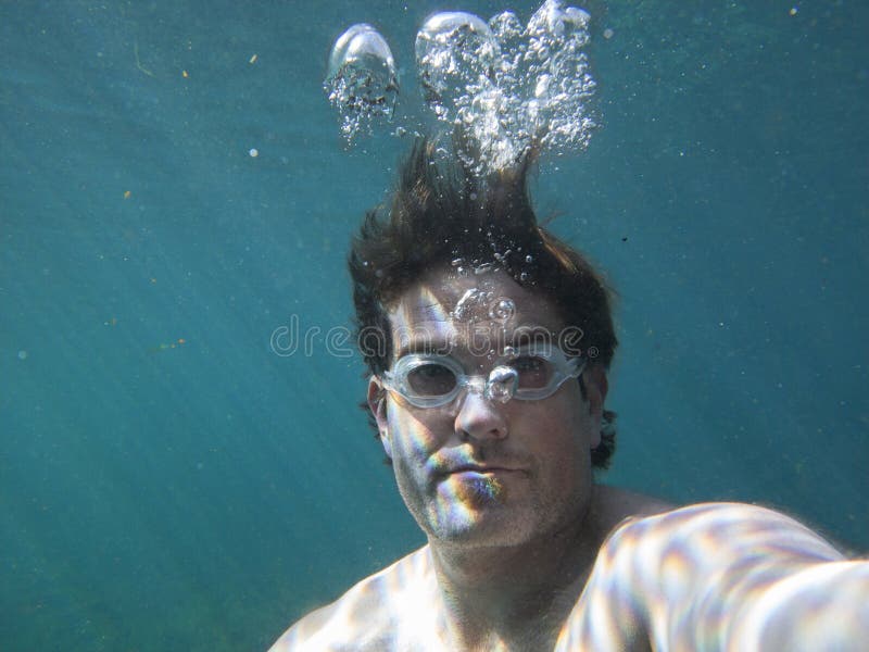 Man swimming underwater stock photo. Image of float, fast - 22802920
