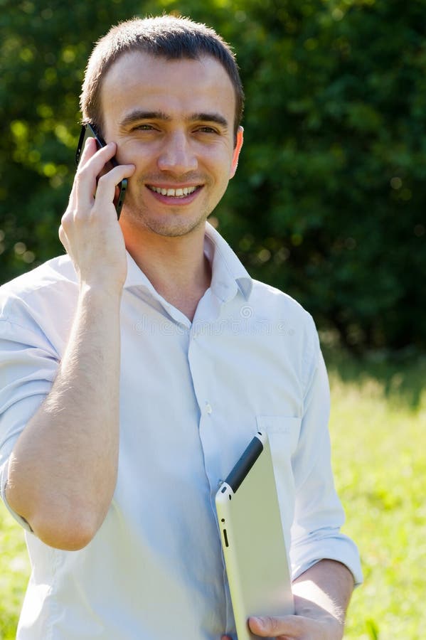 Man talk by phone stock image. Image of handsome, nature - 32191069