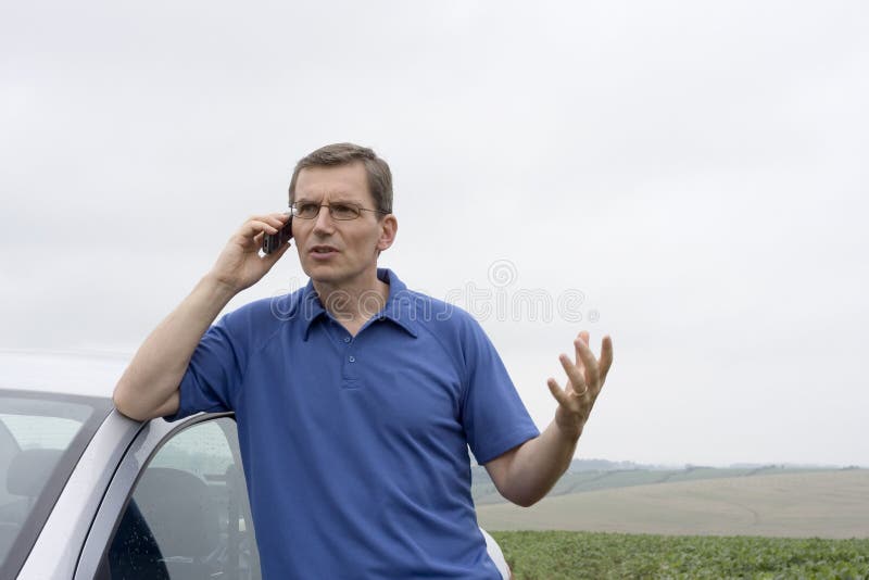 Man Talking on Cell Phone beside a Car Stock Photo - Image of anger ...