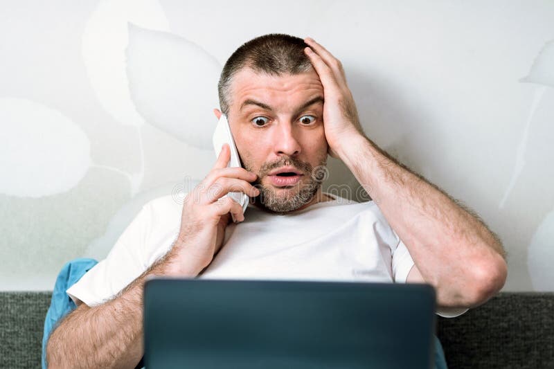 Man Talking on Cellphone Browsing Internet in Bed at Home Stock Image ...