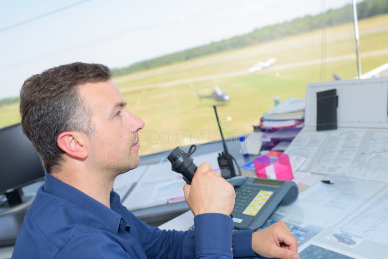 Man in Control Tower Shouting into Radio Receiver Stock Image - Image ...