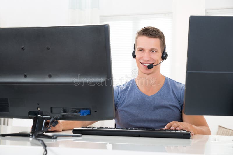 Man Talking with Headset on Computer Stock Image - Image of electronic ...
